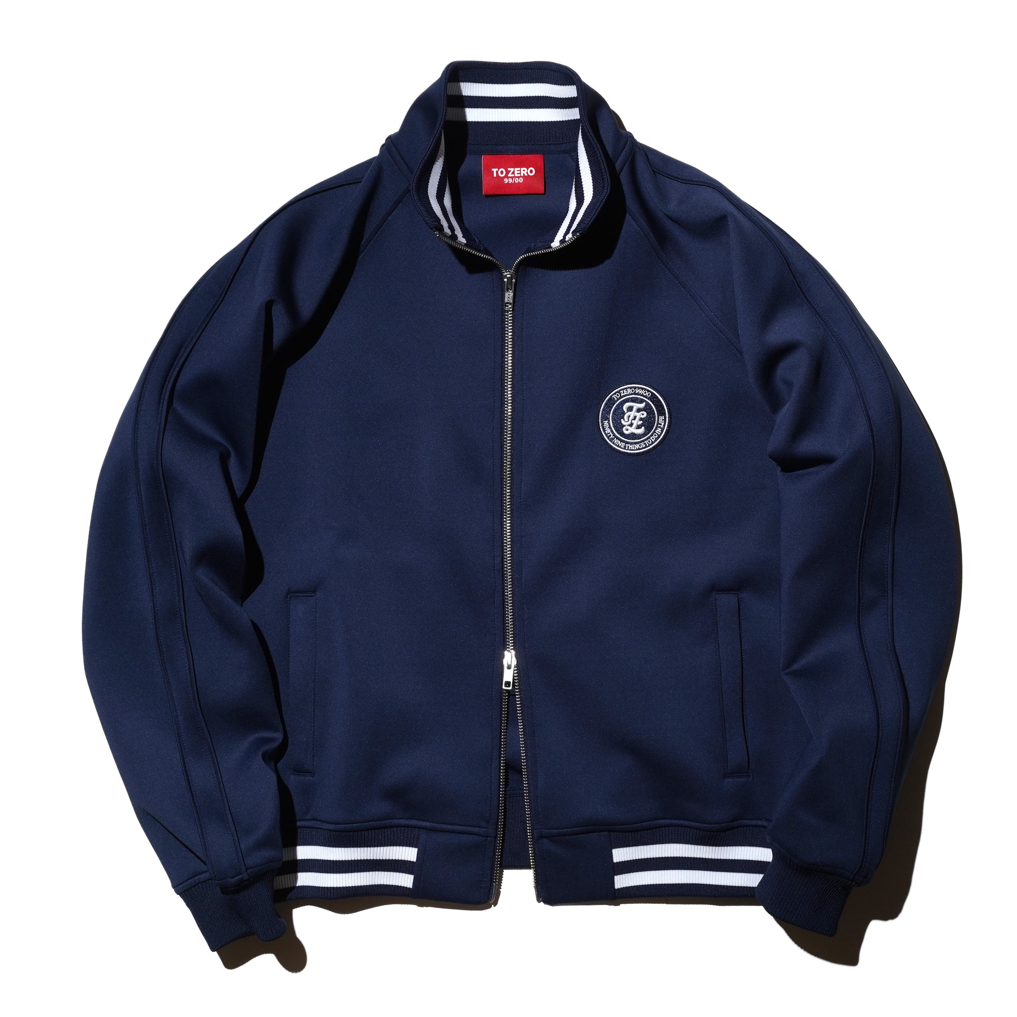 TO ZERO 99/00 EMBROIDERY TRACK JACKET (NAVY)